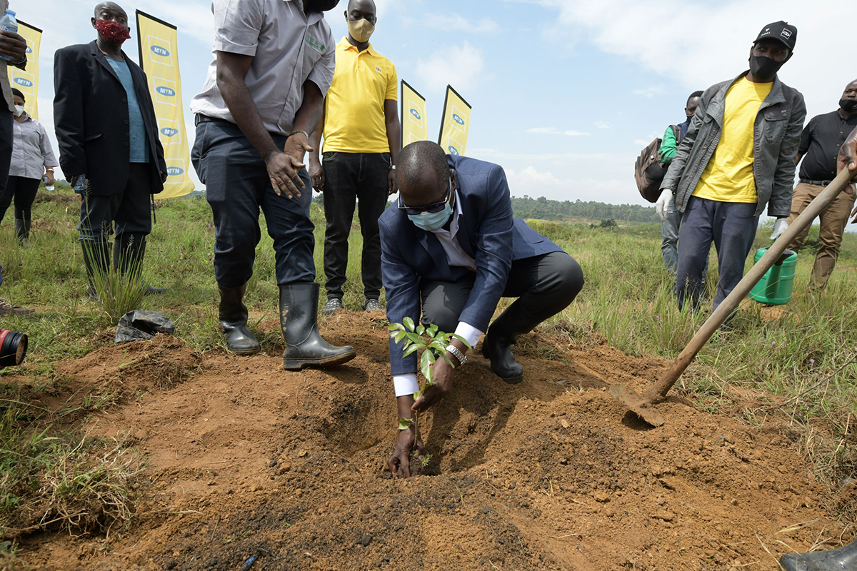 NFA-Executive-Director-Tom-Obong-Okello-planting-a-tree-in-Kwewaga ...