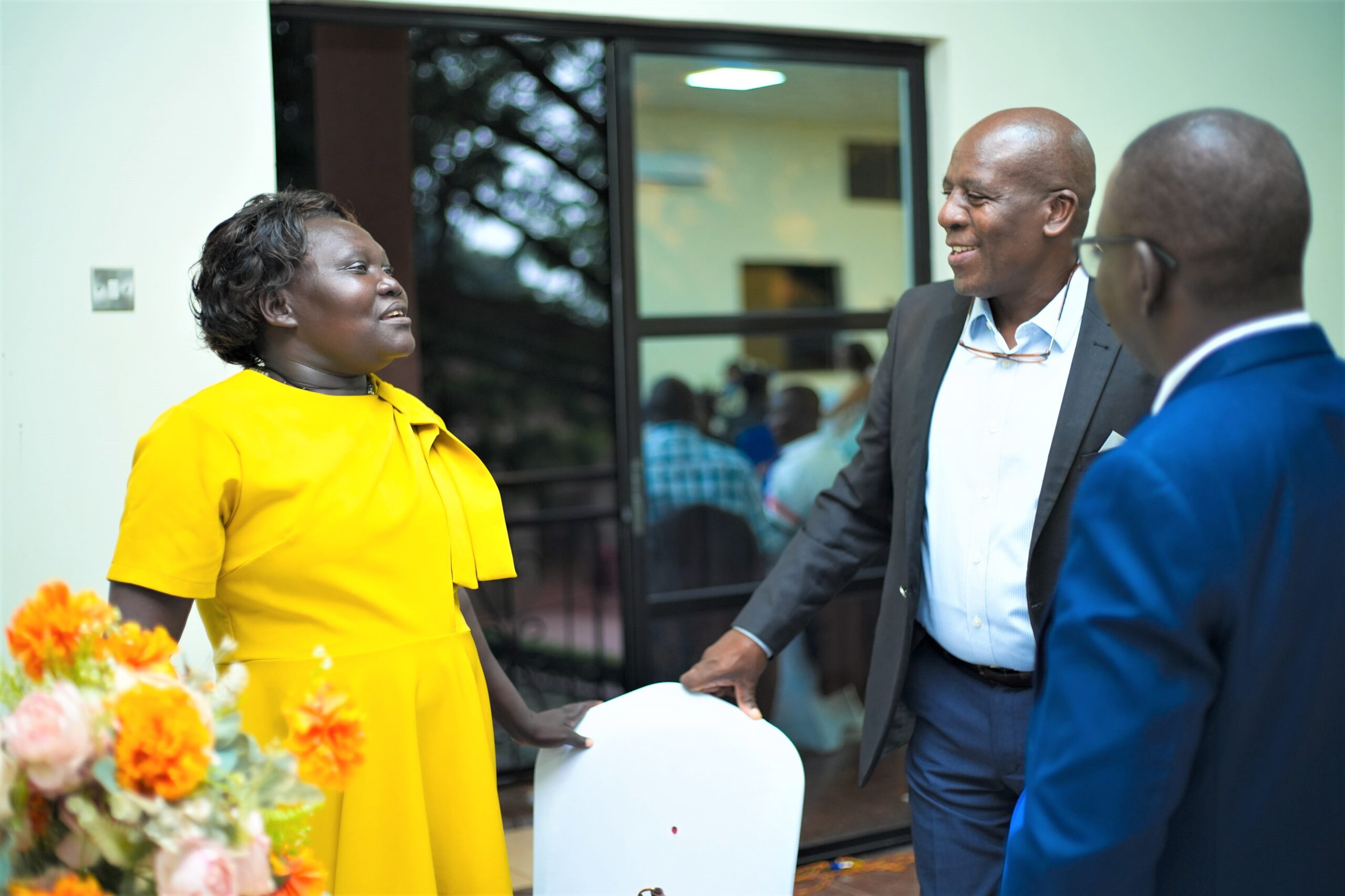 dfcu CEO Charles Mudiwa engaging with stakeholders during the regional ...